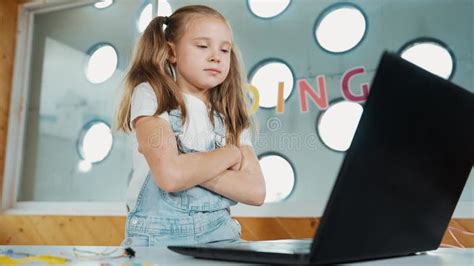 Cute Girl Using Laptop Programing Software While Looking At Camera Erudition Stock Footage