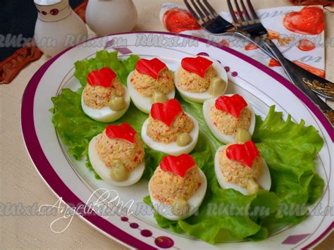 Яйца фаршированные крабовыми палочками 9 фото в рецепте