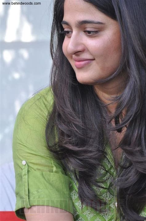 South Indian Model Actress Anushka Long Hair Stills In Green Dress