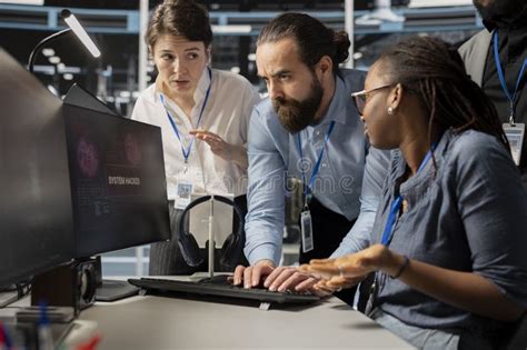 Worried Computer Scientists In Data Center Reacting To Virus Alert Stock Image Image Of