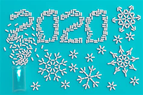 눈송이와 그림 2020의 형태로 파란색 배경에 흩어져 있는 많은 알약 3d 일러스트레이션 12월 31일에 대한 스톡 사진 및 기타 이미지 12월 31일 2020년