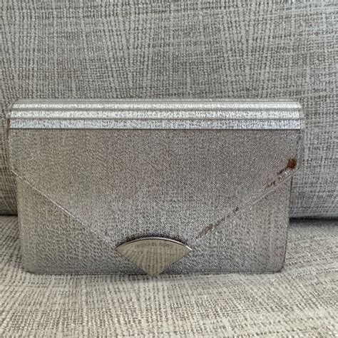 Michael Kors Bags Michael Kors Metallic Silver Clutch Poshmark