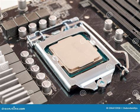 The Process Of Connecting The CPU To The Processor Socket On A Modern Computer Motherboard