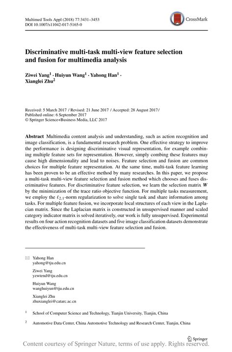 Discriminative Multi Task Multi View Feature Selection And Fusion For Multimedia Analysis