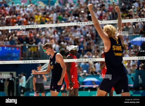Swedens Jonatan Hellvig Left Celebrates In A Beach Volleyball Match Against Cuba At The 2024