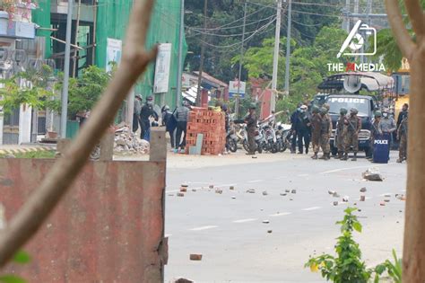 အောင်နန်းကက်သလစ်ဘုရား ကျောင်းအနီးရှိ ဆောက်လုပ်ဆဲတိုက် ပေါ်တွင် ပုန်း အောင် နေသူအများအပြားဖမ