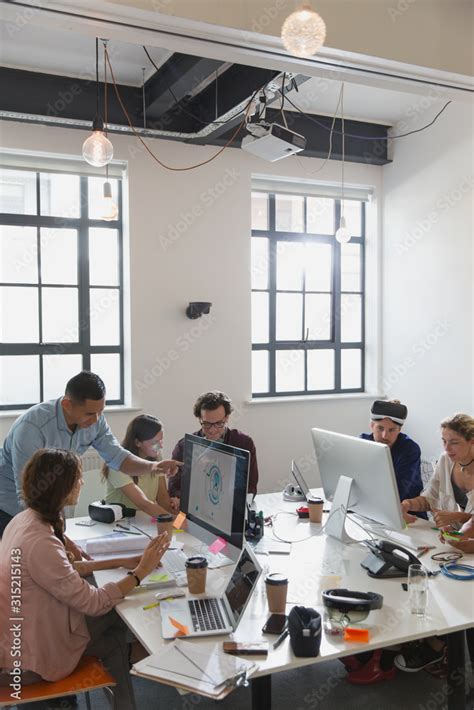 Computer Programmers Programming Virtual Reality Simulator Glasses In