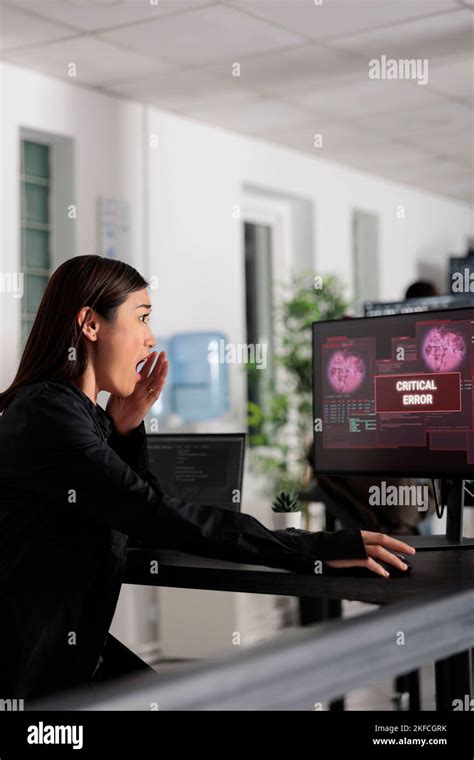 Software Developer Woman Having Web Server Hacked Looking At Critical