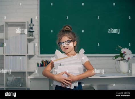 School Girl Studying Math On Lesson In Classroom At Elementary School School Girl Studying Math On Lesson In Classroom At Elementary School