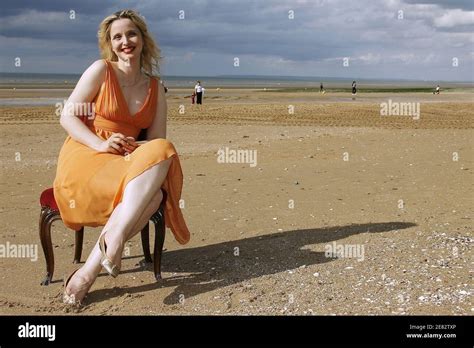 French Actress Julie Delpy Poses For Photographers On The Beach During