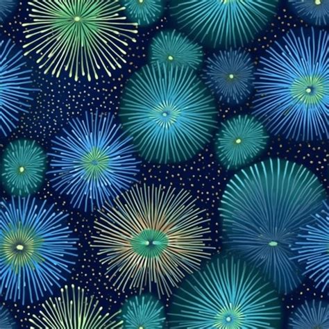 A Close Up Of A Blue And Green Fireworks On A Black Background