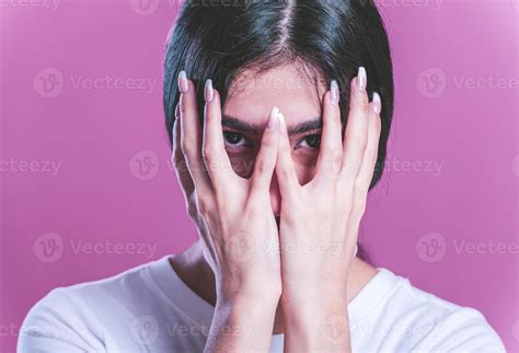 Photo Of Young Asian Girl Amazed Shocked Afraid Scared Hands Cover Face