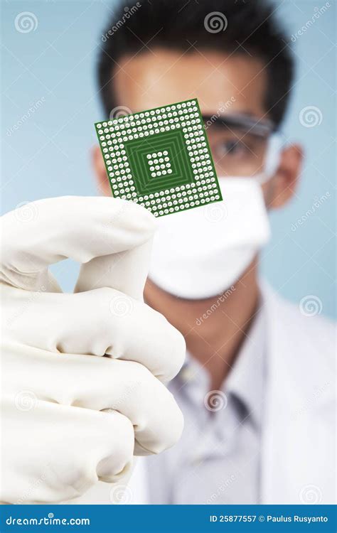 scientist showing a microchip computer stock image image of face