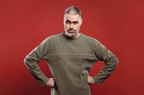 Premium Photo Serious Man With Both Hands On His Waist