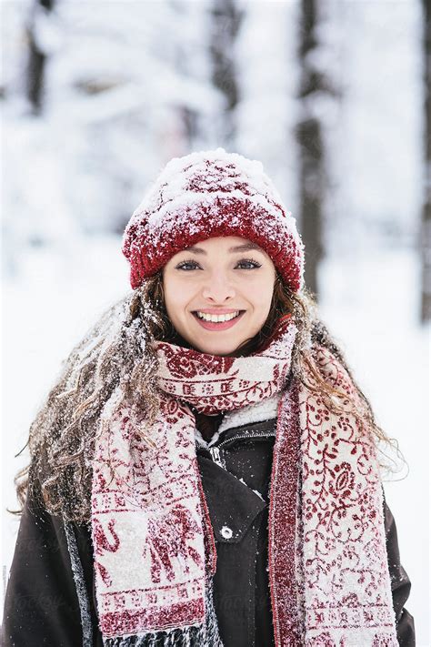 Portrait Of Beautiful Woman Smiling At The Camera In Winter By