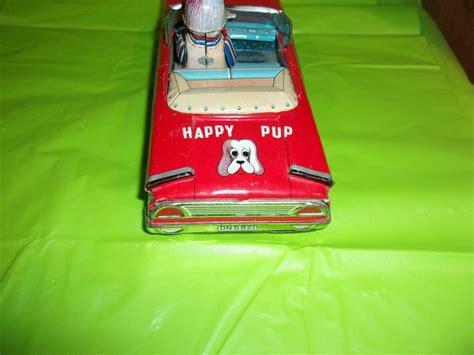 Rare Vintage Alps Happy Pup 1960 Ford Tin Friction Toy Car