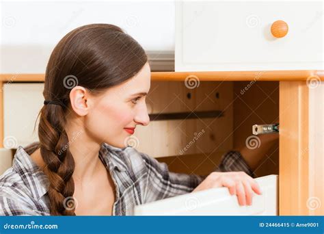 Young Woman Is Assembling A Cupboard Stock Image Image Of Beautiful