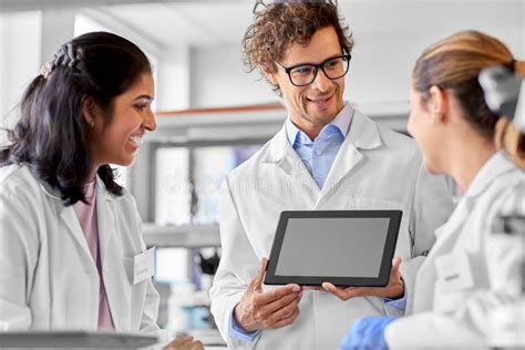 Scientists With Tablet Pc Working In Laboratory Stock Image Image Of Online Discovery 254442655