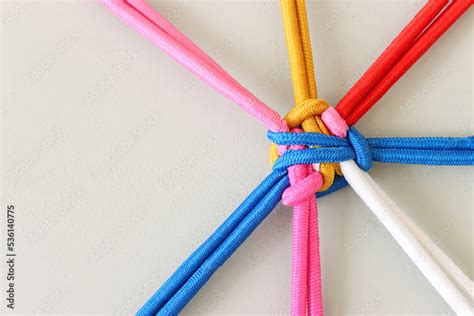 Concept Image Of Unity And Teamwork Ropes Tied Together As A Symbol Of