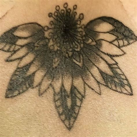 Intricate Tattoo Design On Woman S Chest