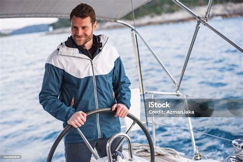 Caucasian Good Looking Sailor Smiling And Looking At The Horizon Stock