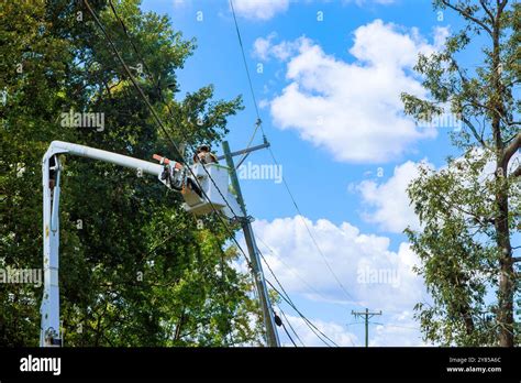 An Emergency Response Team Is Working To Restore Power Following Severe