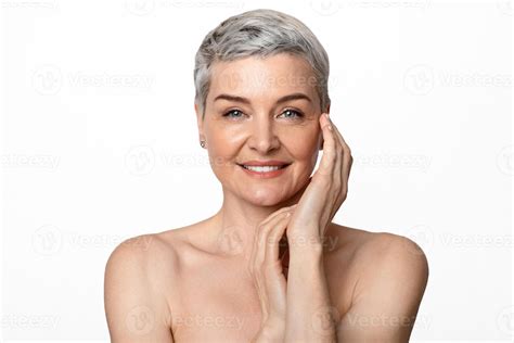 Aged Beauty Portrait Of Attractive Nude Mature Lady With Smooth Skin