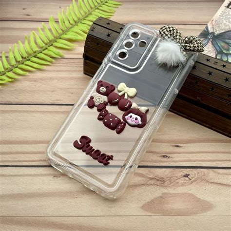 قاب گوشی Galaxy A04s سامسونگ عروسکی برجسته سه بعدی پام پام دار زرشکی