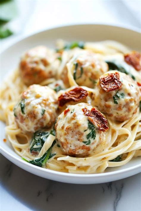 Baked Chicken Ricotta Meatballs With Spinach Alfredo Sauce Taste Of Recipe