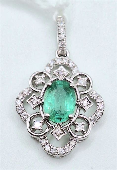 Emerald And Diamond Pendant In 14ct White Gold Pendantslockets