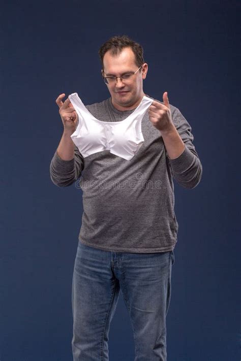 Man Holding A Woman S Bra Stock Photo Image Of Brassiere