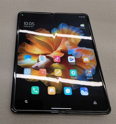 Xiaomi выпустила смартфон с гибким экраном и собственной «Windows ...