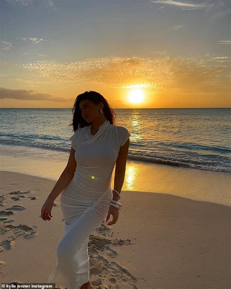 Kylie Jenner Wraps Her Arms Around A Shirtless Travis Scott In Romantic Seaside Snaps Daily