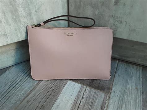 Шкіряна косметичка клатч Kate Spade — ціна 280 грн у каталозі