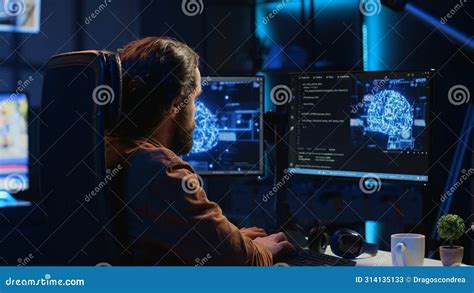 developer uses computer to update artificial intelligence neural