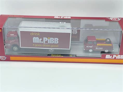 m2 machines auto haulers 1966 ford c950 truck and 1964 econoline truck 1 64 scale tw12