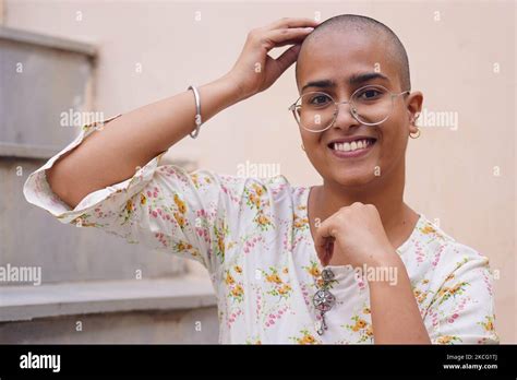 22 Year Old Varsha Kumawat Poses For A Photograph After Shaving Her