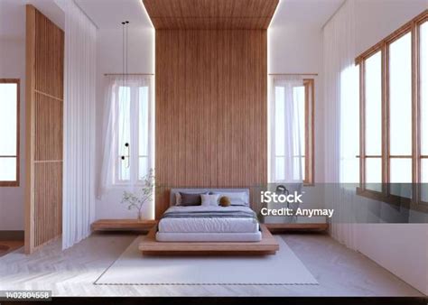 3d 렌더링 3d 일러스트레이션 인테리어 장면 및 모형 나무 헤드 보드로 장식 된 현대적인 스타일의 침실 따뜻한 흰색 조명 침대 옆 테이블 및 내장 침대로 장식 된 이중 벽