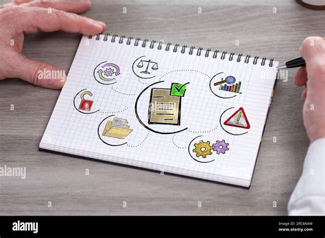 Hand Holding A Notepad With Validation Concept Stock Photo Alamy