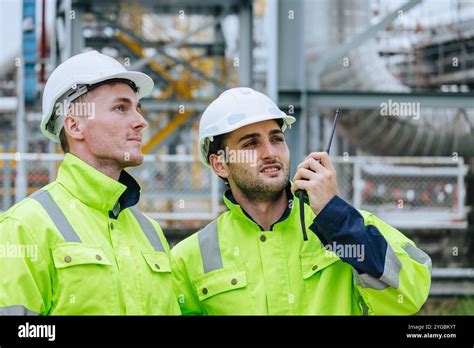 Engineer Oil And Gas Refinery Pipe Service Team Worker Working Together