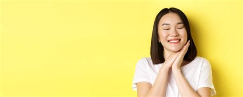 Free Photo Close Up Of Romantic Asian Woman Dreaming Of Something