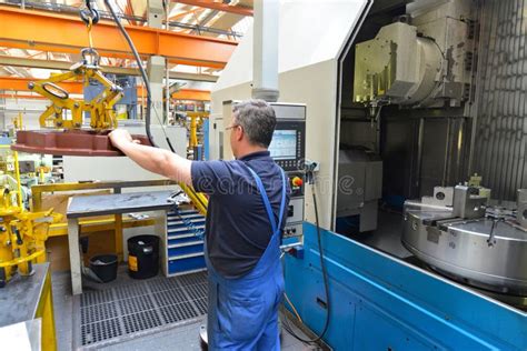 Large Modern Cnc Machine For The Production Of Shafts For Industrial Electric Motors In The