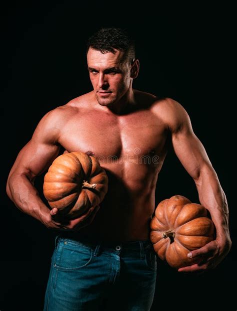 Halloween Man Hold Pumpkin Man With Muscular Body And Bare Torso