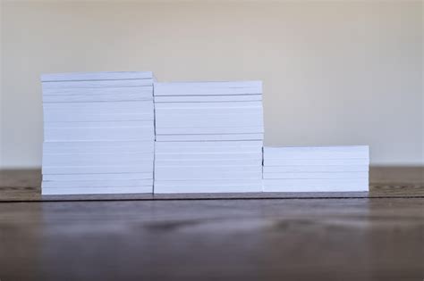 Premium Photo Stacks Of Notepads On Office Table To Be Disributed