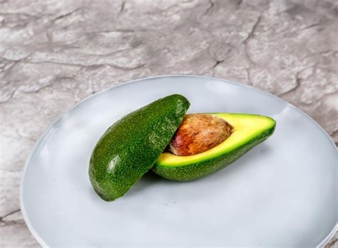 Premium Photo Fresh Green Avocado Closeup