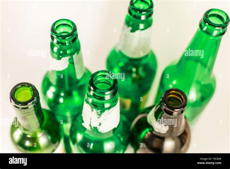 Top View Of A Pack Of Empty Green And Brown Wine And Beer Glass Bottles