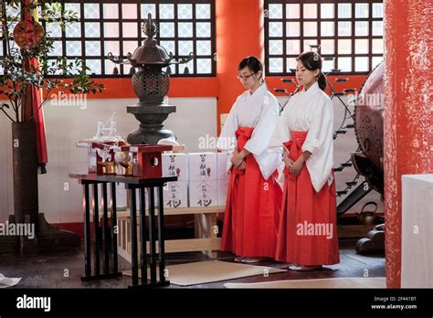 Miko Shrine Maidens In Attendance At Itsukushima Shinto Shrine
