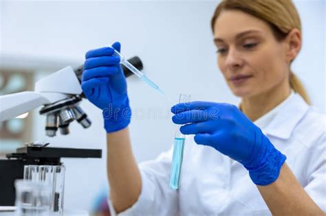 Scientist In Laboratory Researcher Doing Investigations With Test Tubes Molecular Biology Dna