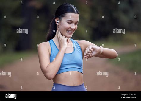 Fitness Runner And Woman Checking Watch For Pulse Time Or Heart Rate