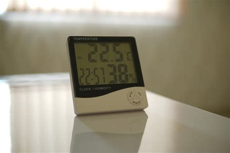 Premium Photo A Digital Clock And Signal Temperature Premium Photo A Digital Clock And Signal Temperature